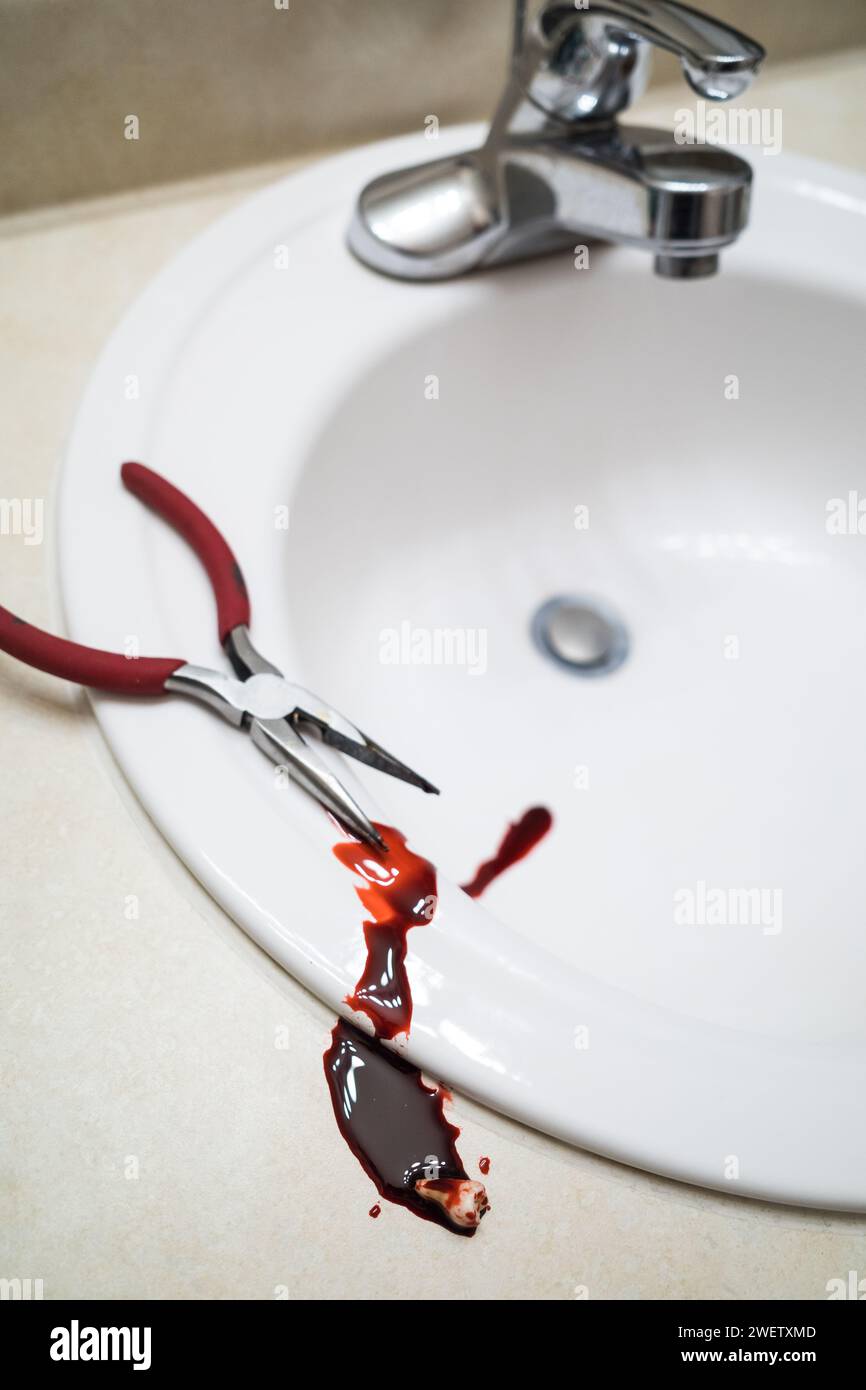 Seattle, USA. 22 Jan, 2024. Self tooth extraction concept Stock Photo ...