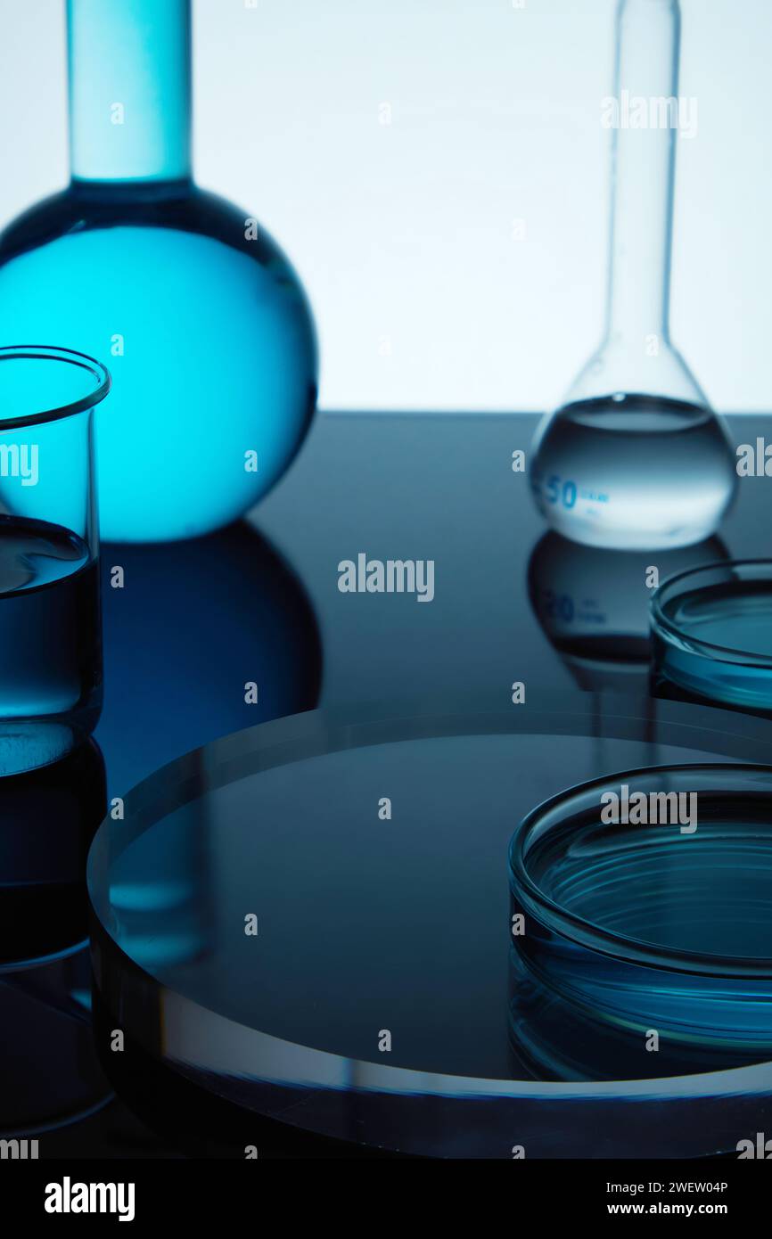 Minimal art background with transparent podium, lab glassware ...