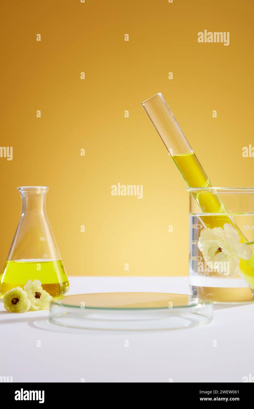 Front view of laboratory equipment filled with yellow liquid in ...