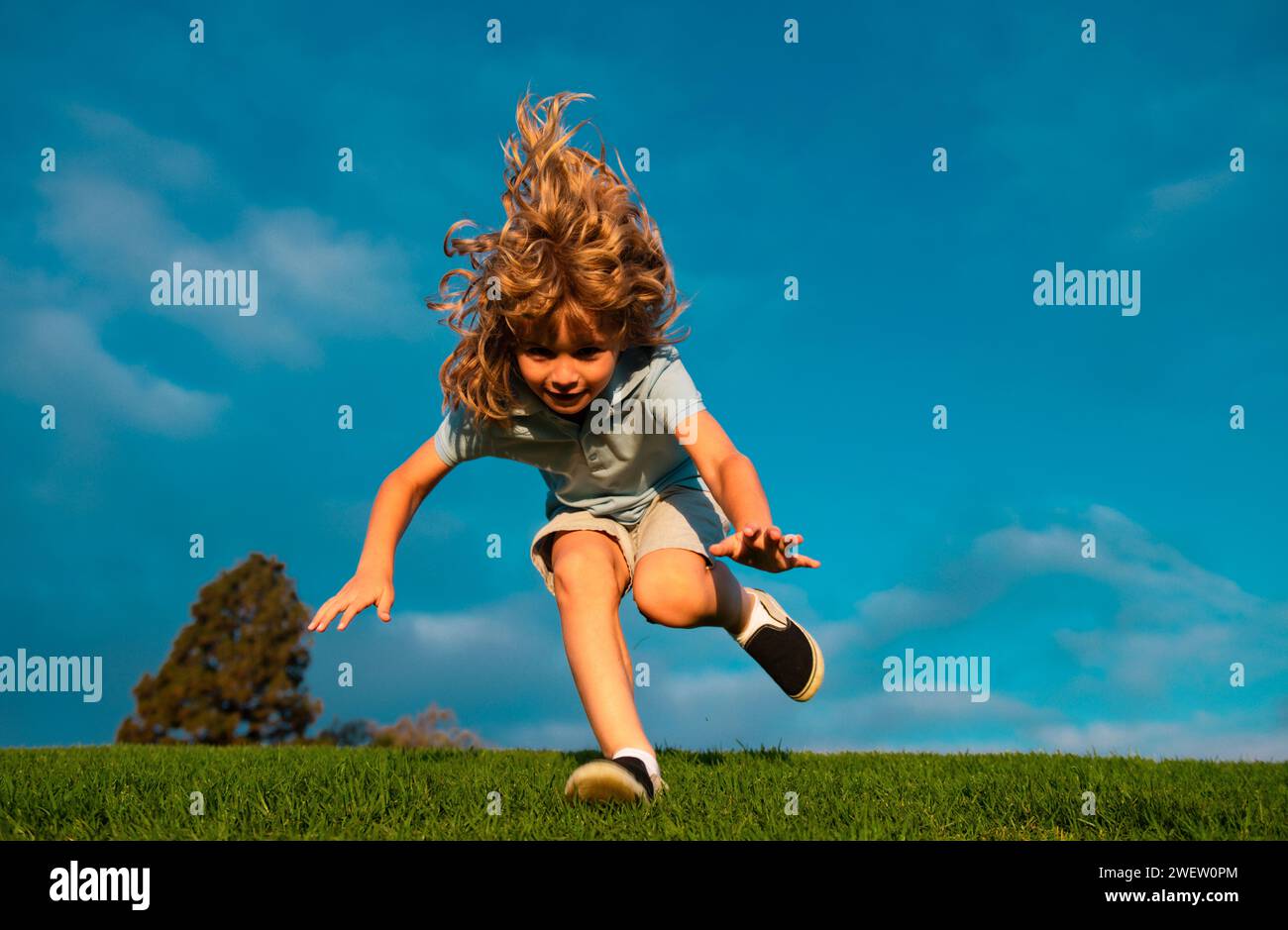 Blonde boy jumping falling on hi-res stock photography and images - Alamy