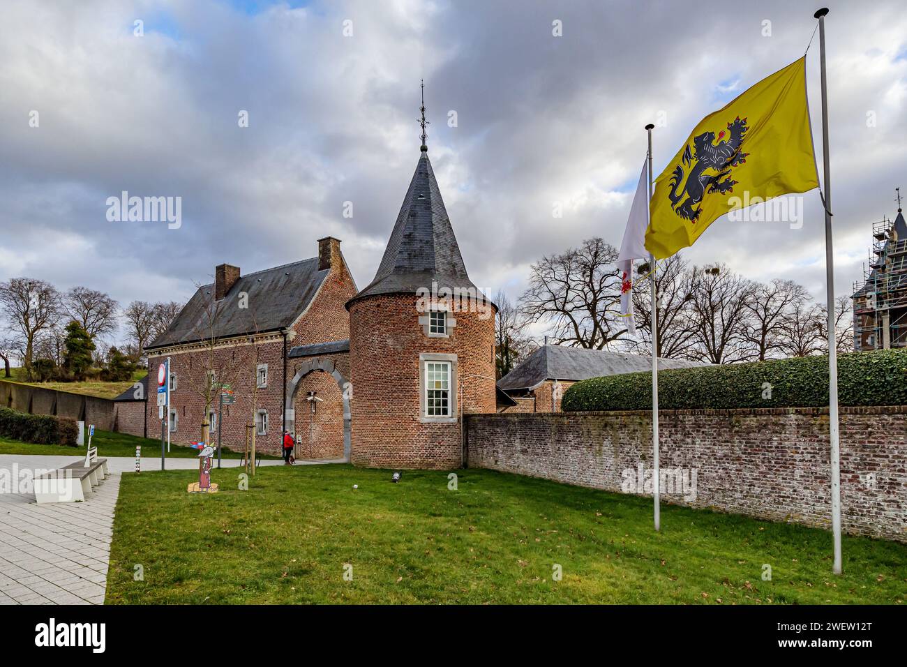 Exterior of former 16th century Alden Biesen castle, yellow Flanders ...