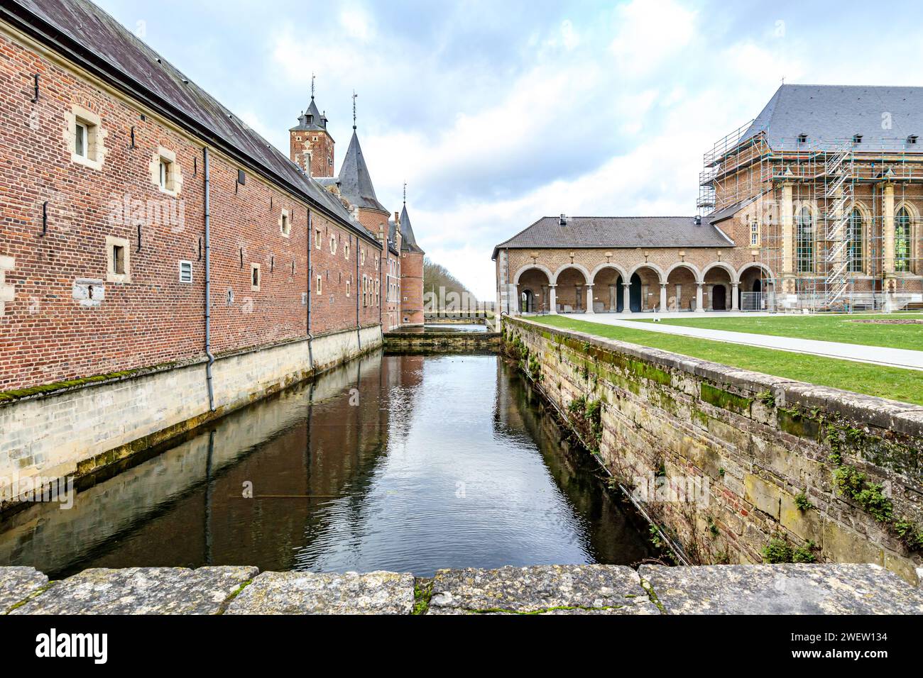 Straight moat between Alden Biesen castle and outer courtyard, building ...
