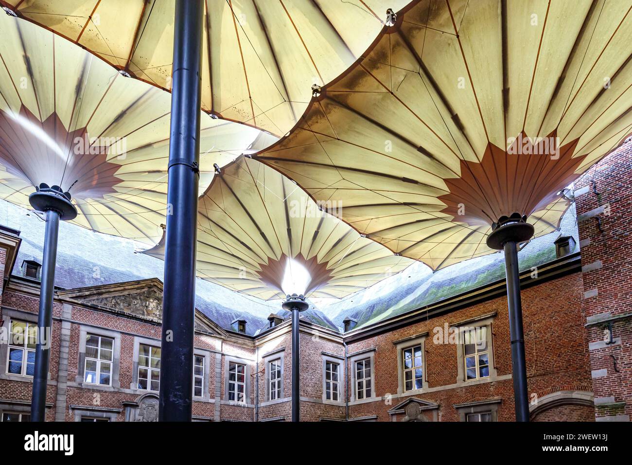 Huge parasols covering outer courtyard of former 16th century Alden ...
