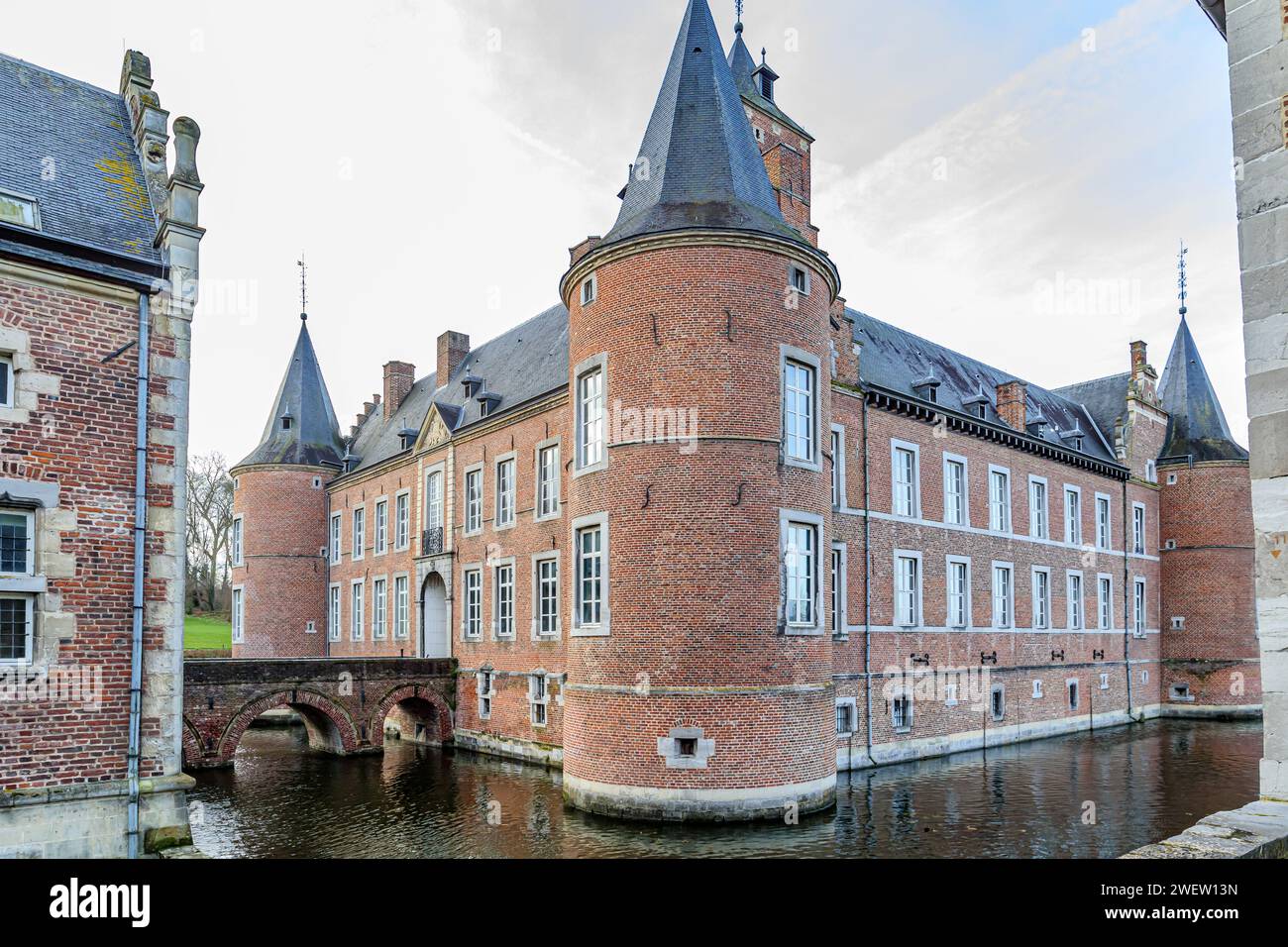 Moat surrounding Alden Biesen Castle with bridge in background, corner ...