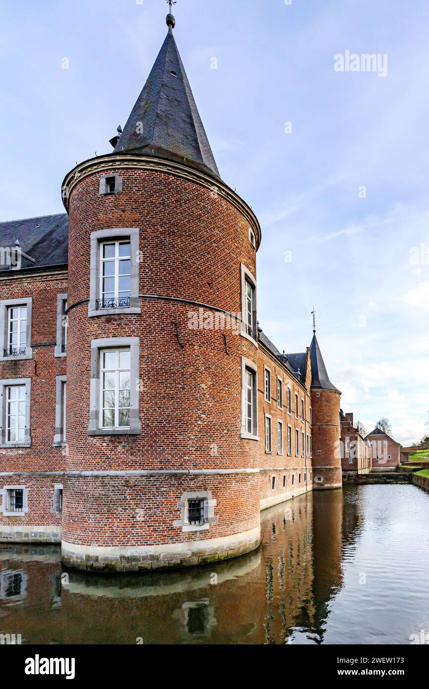 Moat surrounding 16th century Alden Biesen castle, circular tower ...