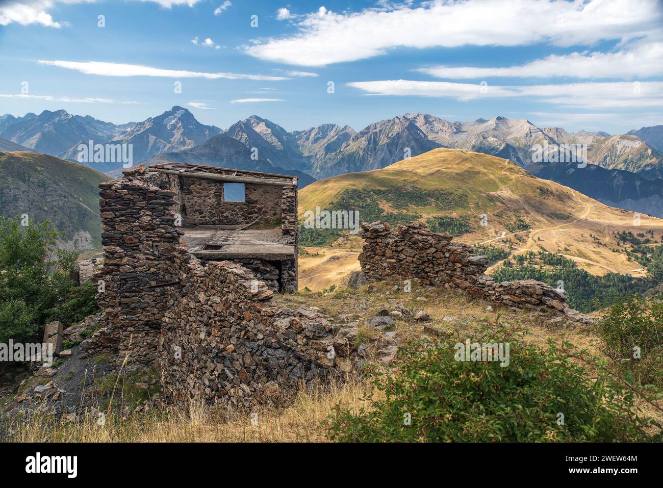 Mountain landscape with an old house destroyed in stone at l'Alpe d ...