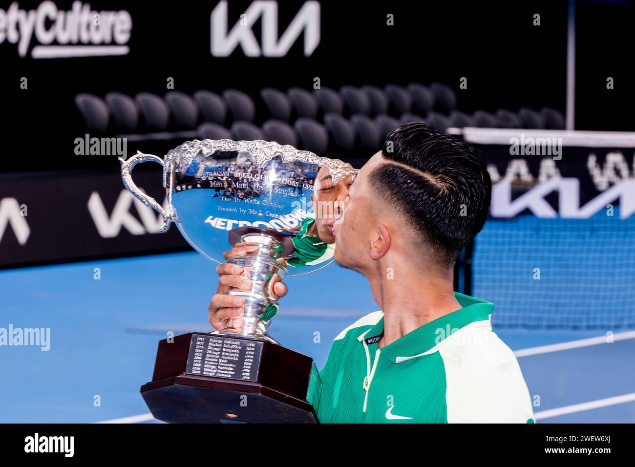 MELBOURNE, VIC - JANUARY 27: Tokito Oda of Japan kisses his trophy at ...
