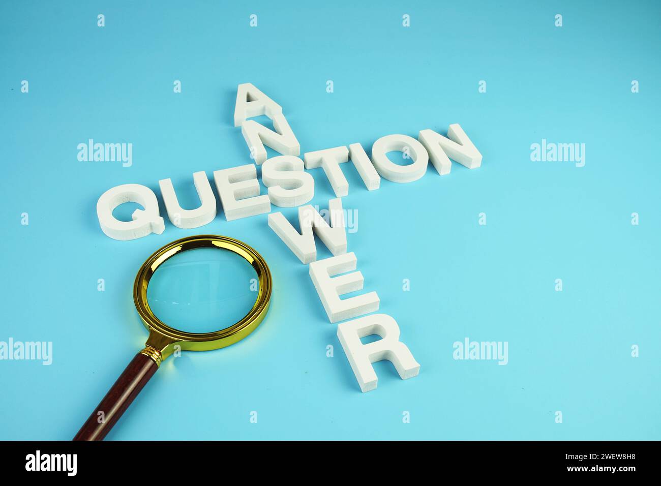 Question and Answer alphabet letters with magnifying glass on blue ...