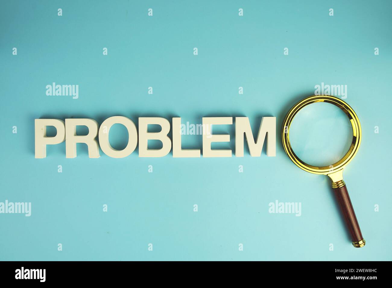 Problem alphabet letters with magnifying glass on blue background Stock ...