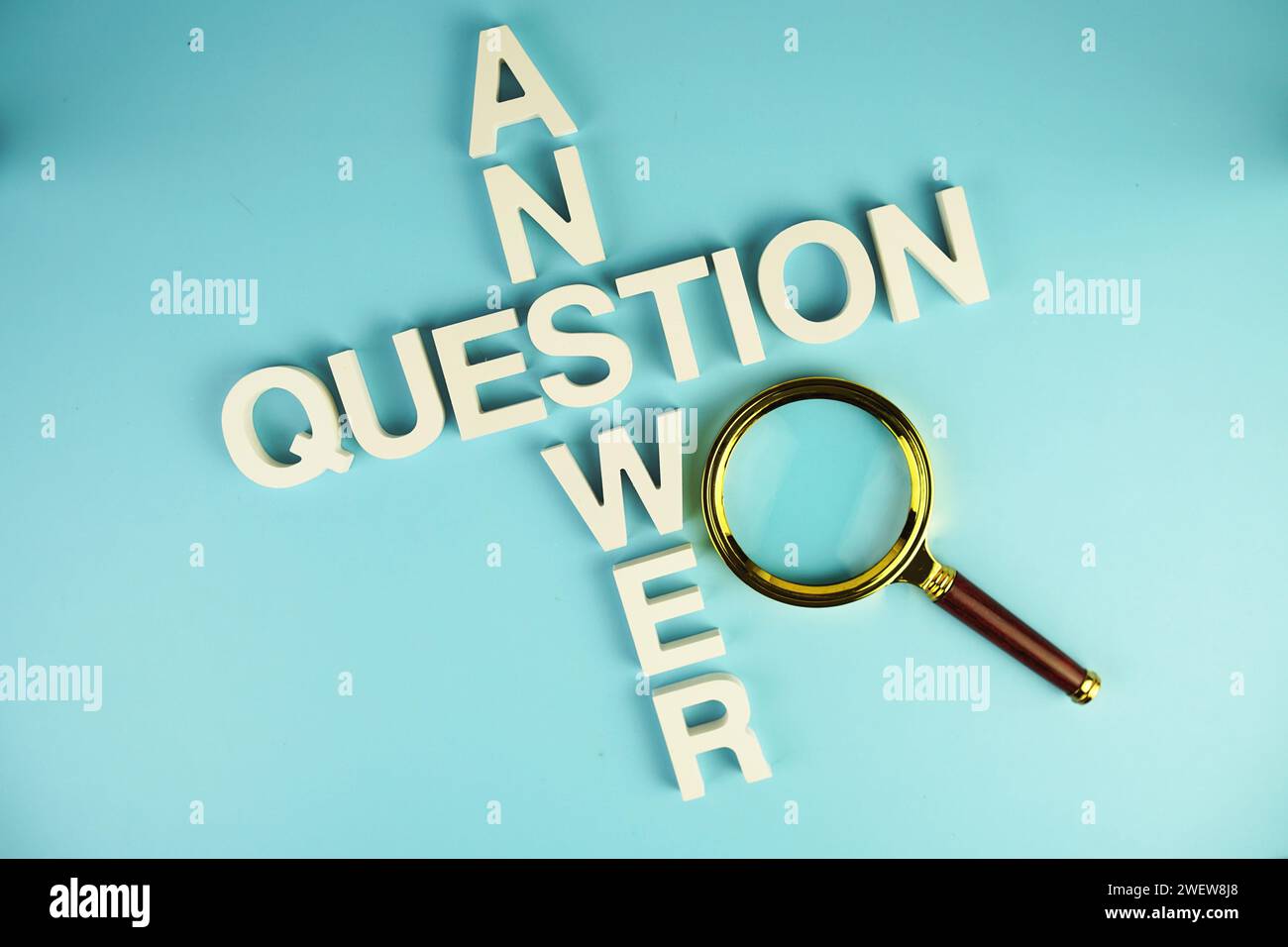 Question and Answer alphabet letters with magnifying glass on blue ...