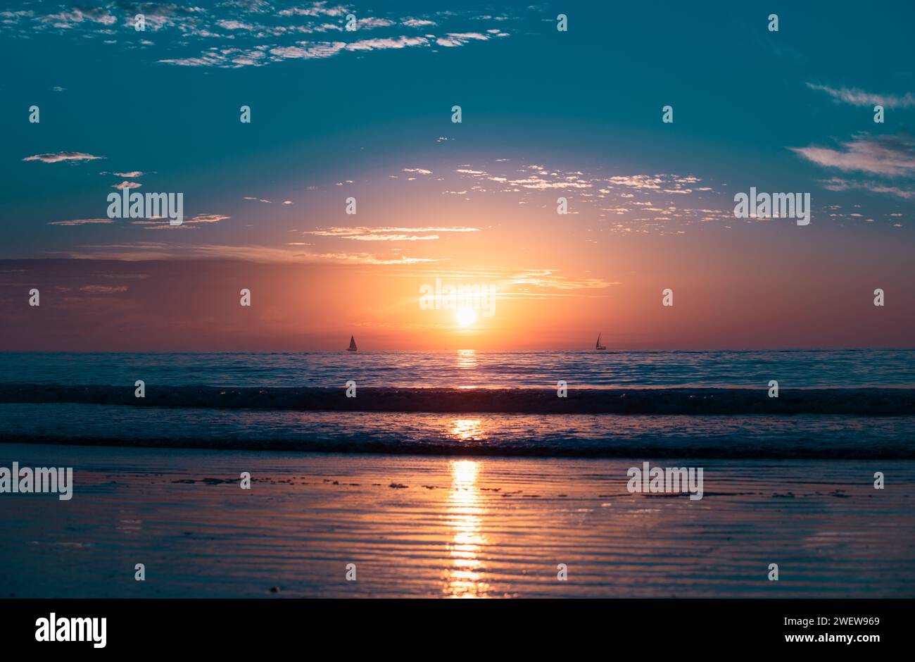 Beautiful sunrise, sun, blue sky with cloud and the sea landscape ...