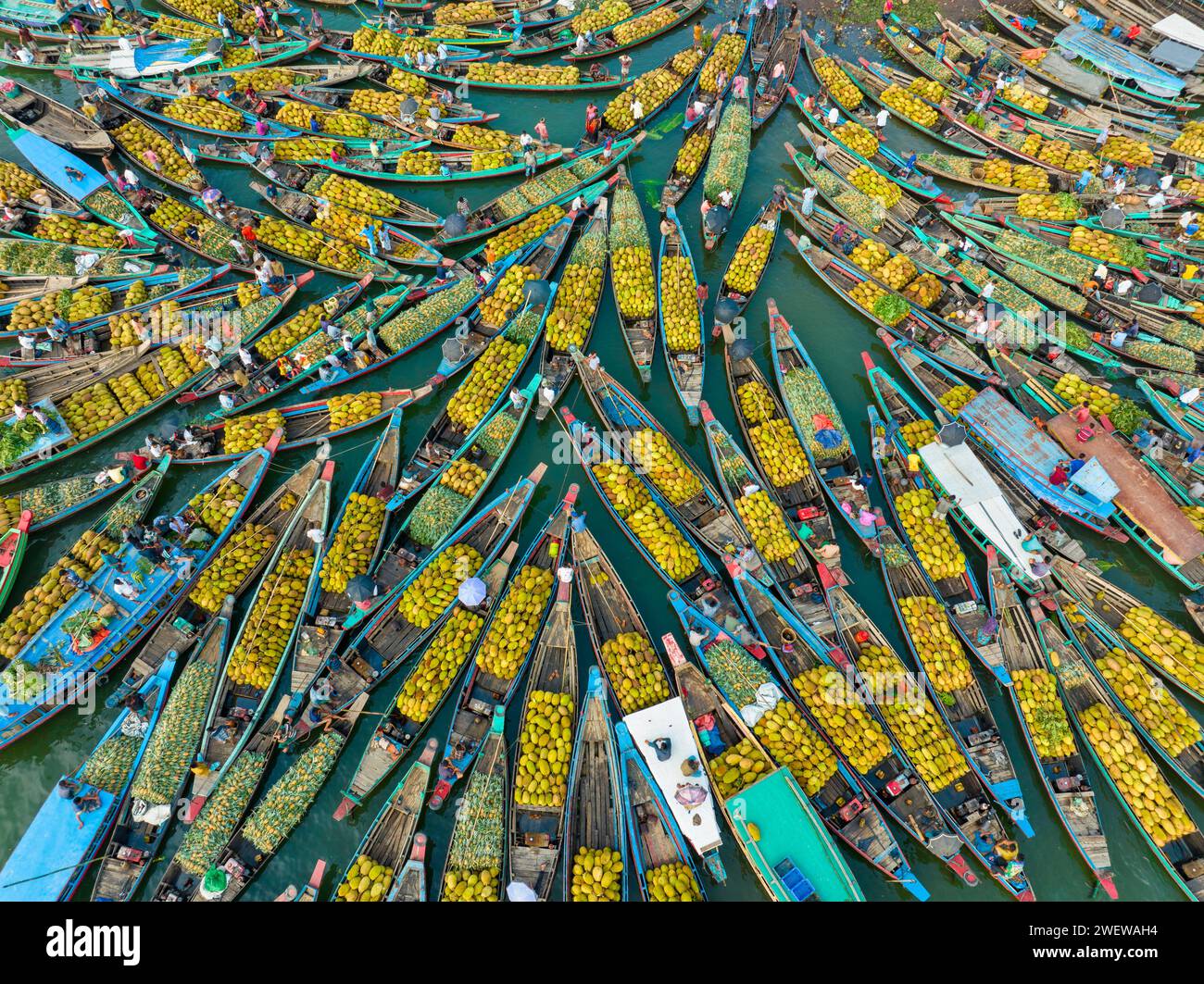 Aerial view of floating market of seasonal fruits on the boats in ...