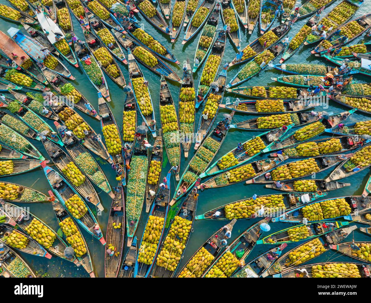 Aerial view of floating market of seasonal fruits on the boats in ...