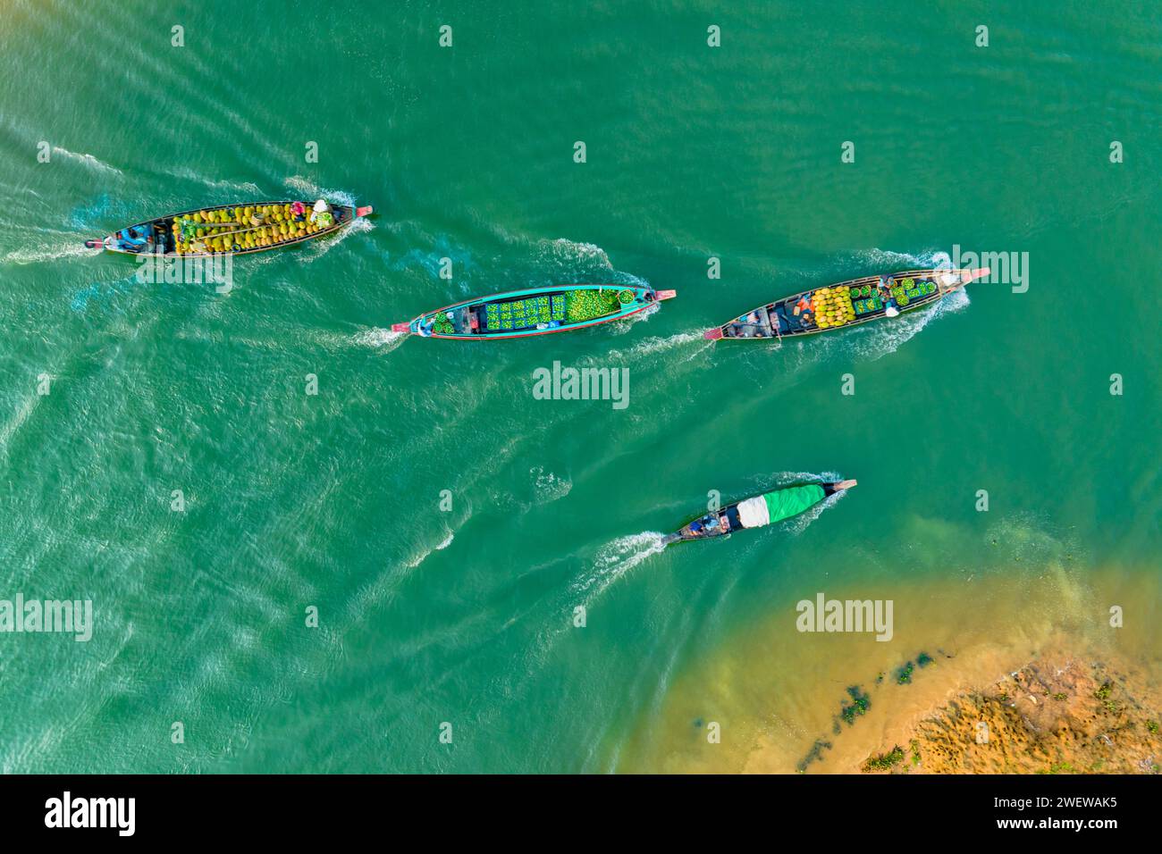 Aerial view of floating market of seasonal fruits on the boats in ...
