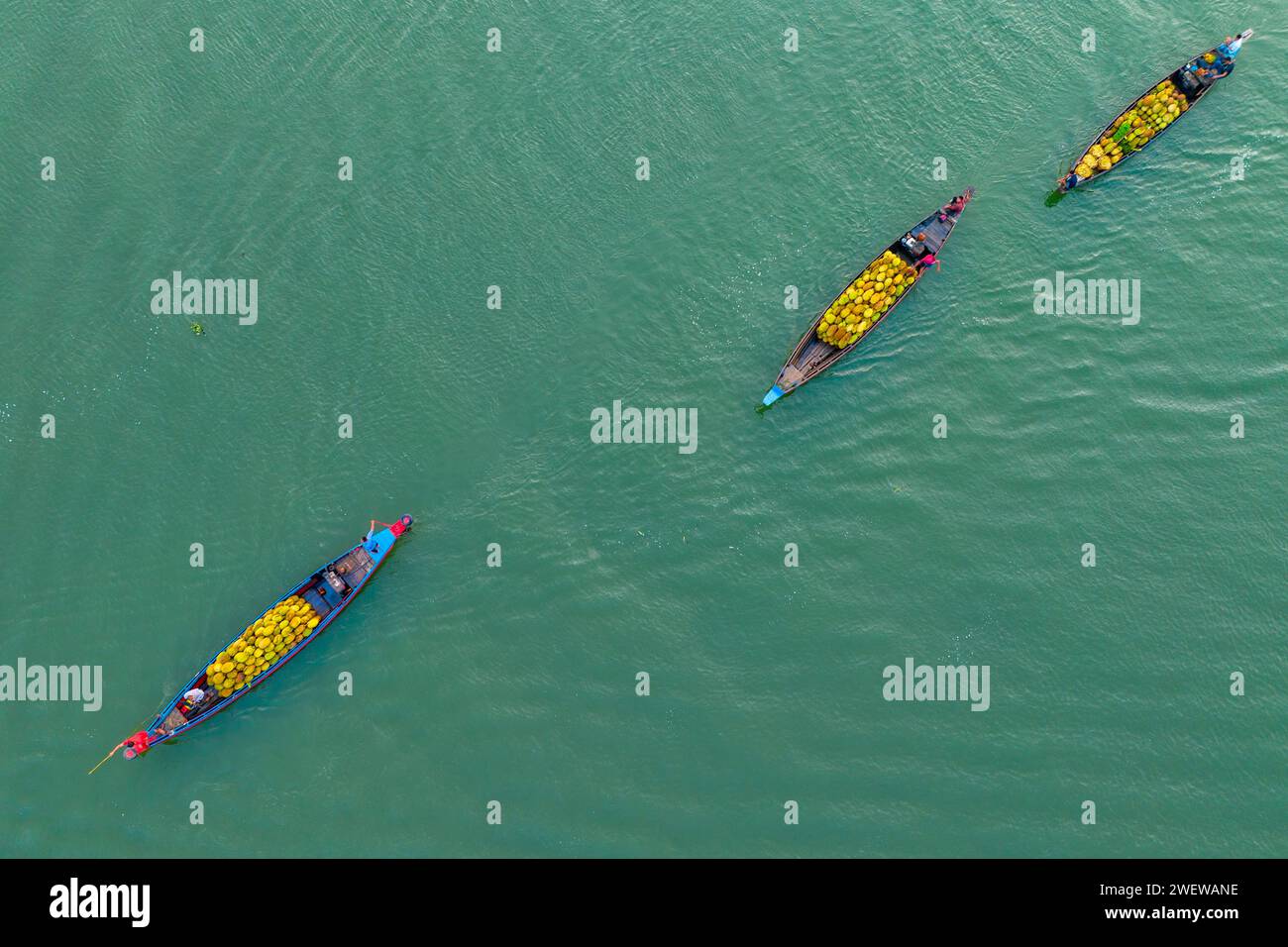 Aerial view of floating market of seasonal fruits on the boats in ...