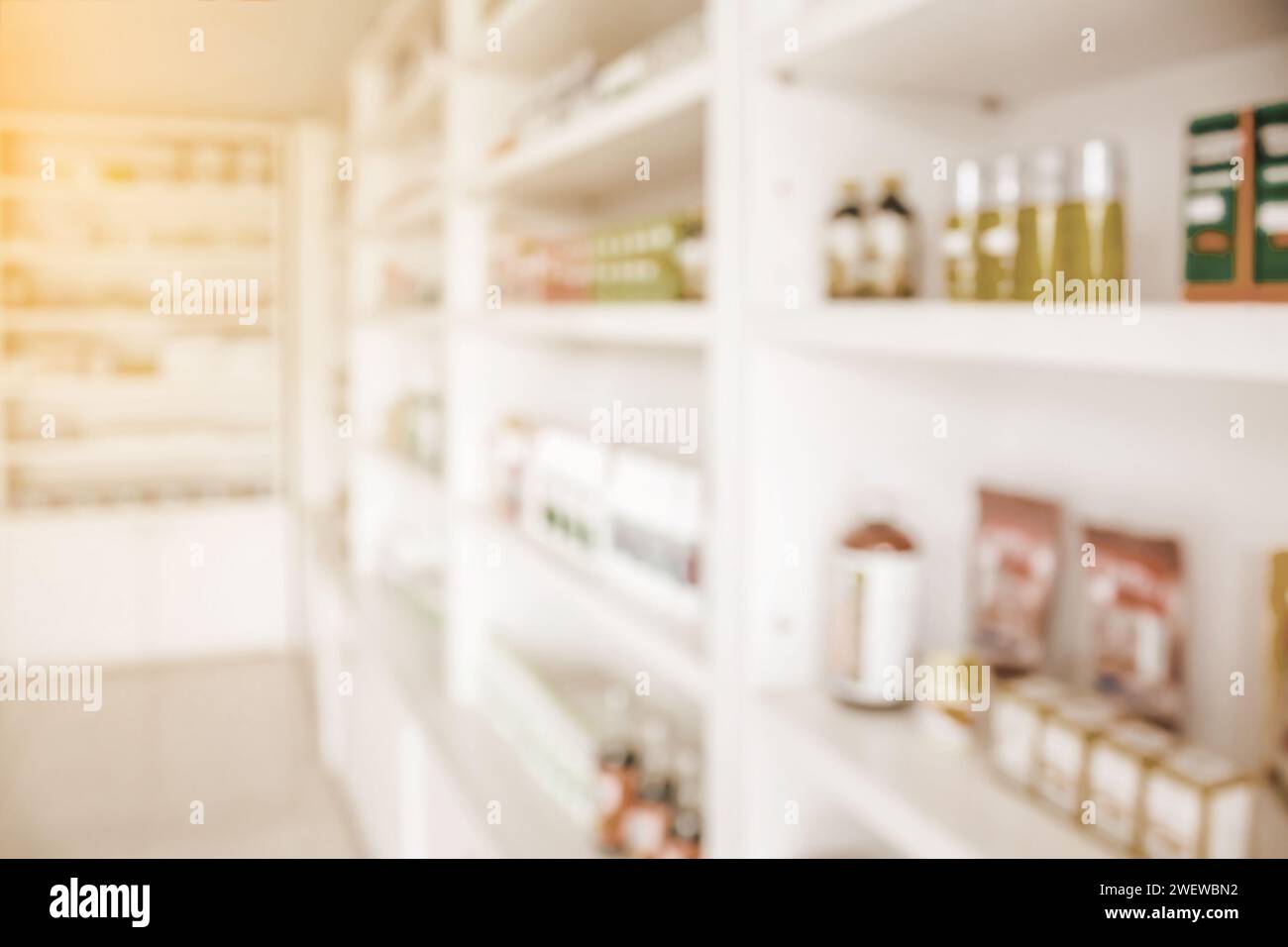 pharmacy shelves filled with medication blur background Stock Photo - Alamy