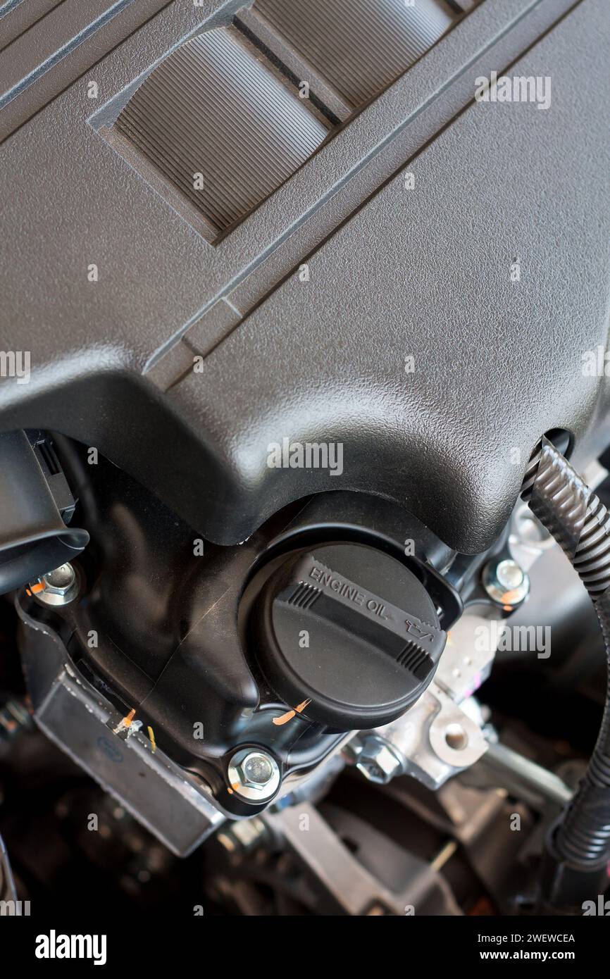 closeup engine oil cap in car engine Stock Photo - Alamy