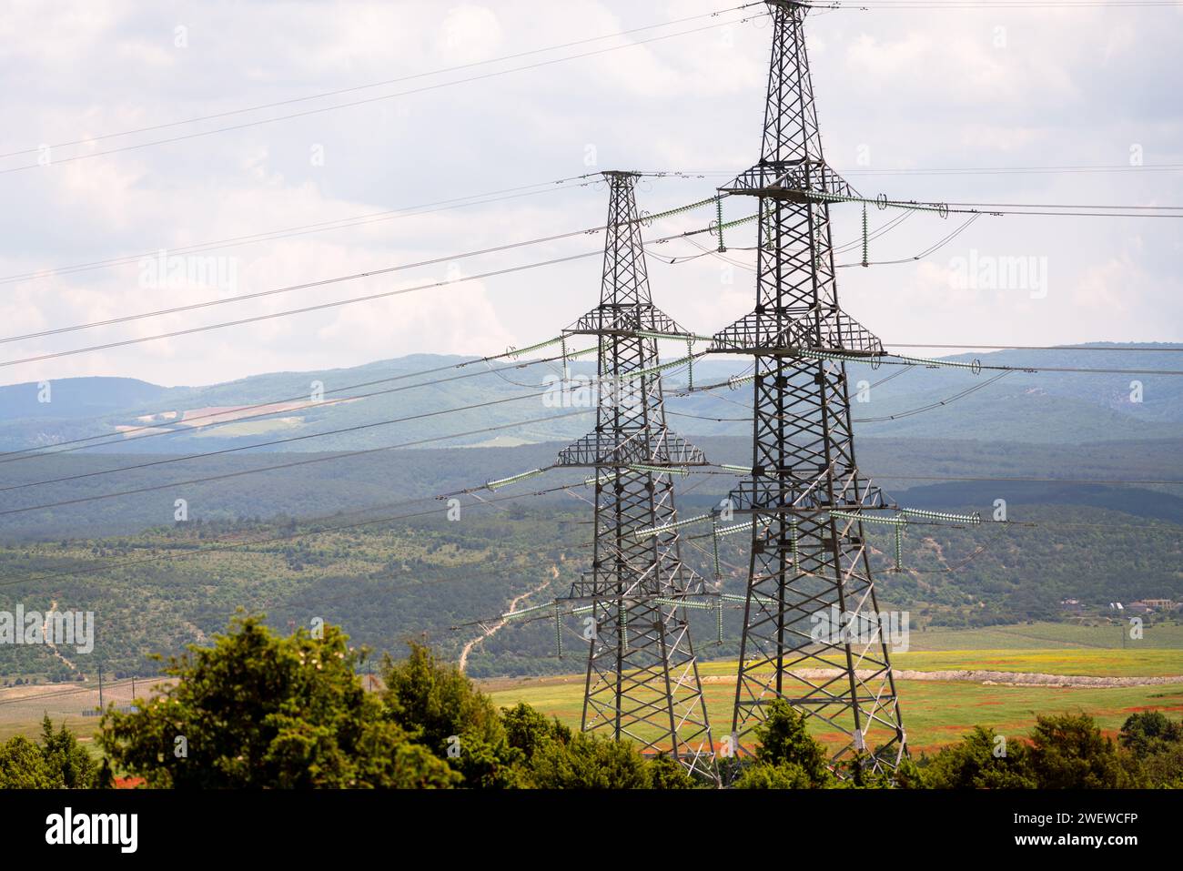 High voltage towers Electric pole. Power line support with wires for ...