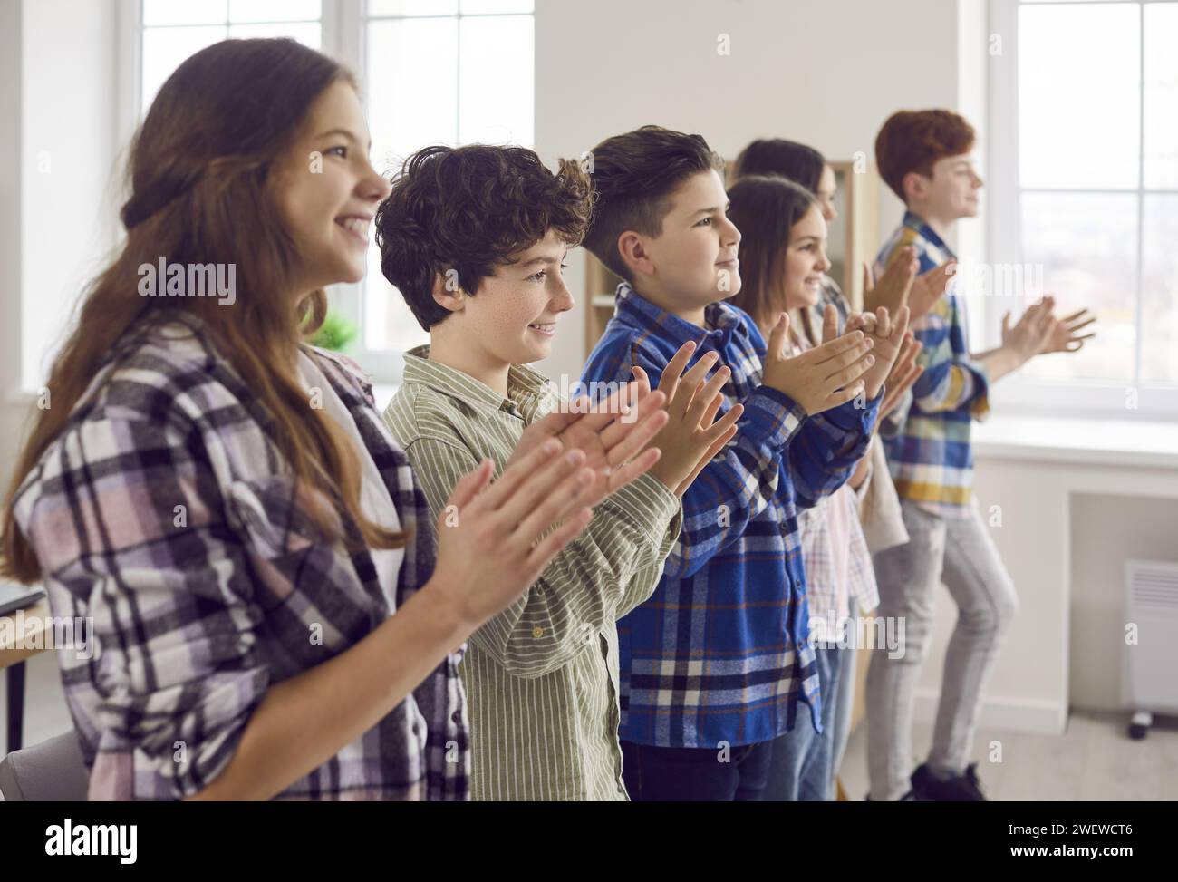 Children clapping classroom hi-res stock photography and images - Alamy