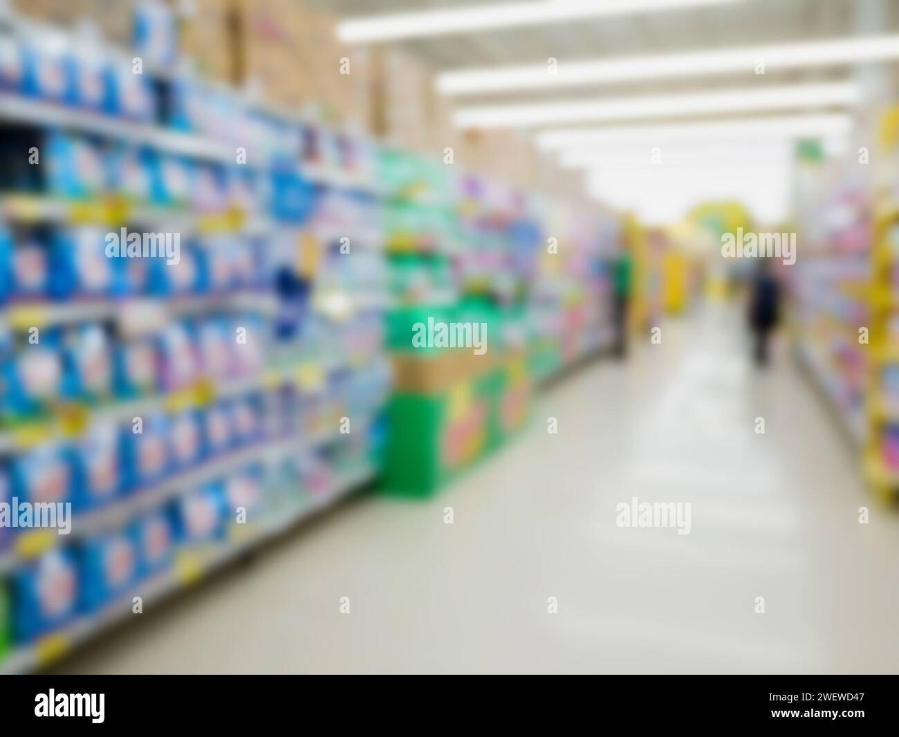 detergent shelves in laundry section in supermarket or grocery store ...