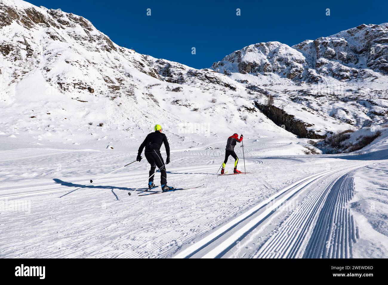 Nordic ski scene in the italian alps Stock Photo - Alamy