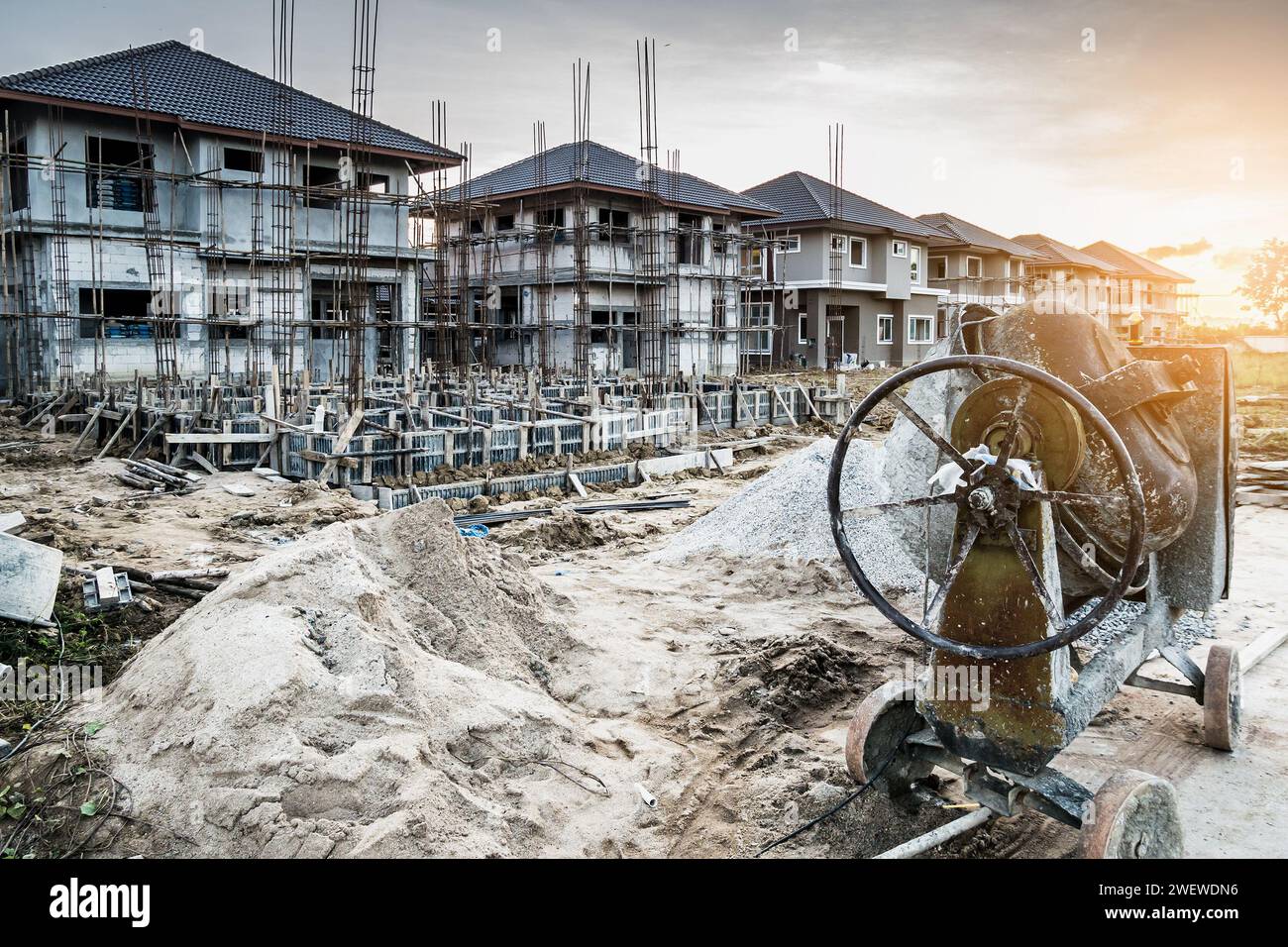 cement concrete mixer machine at new house building construction site ...