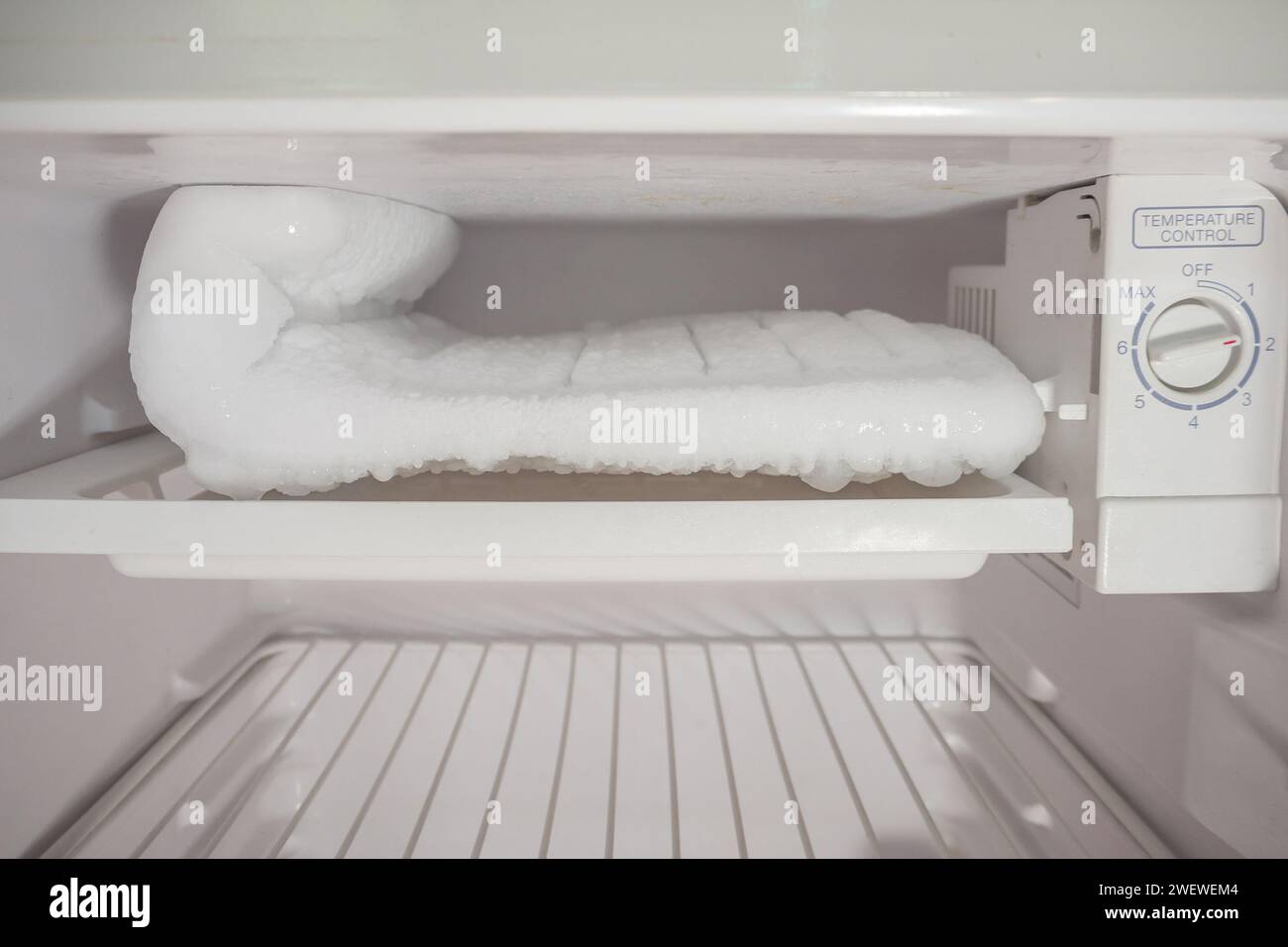 frozen Ice buildup in the freezer of refrigerator Stock Photo - Alamy