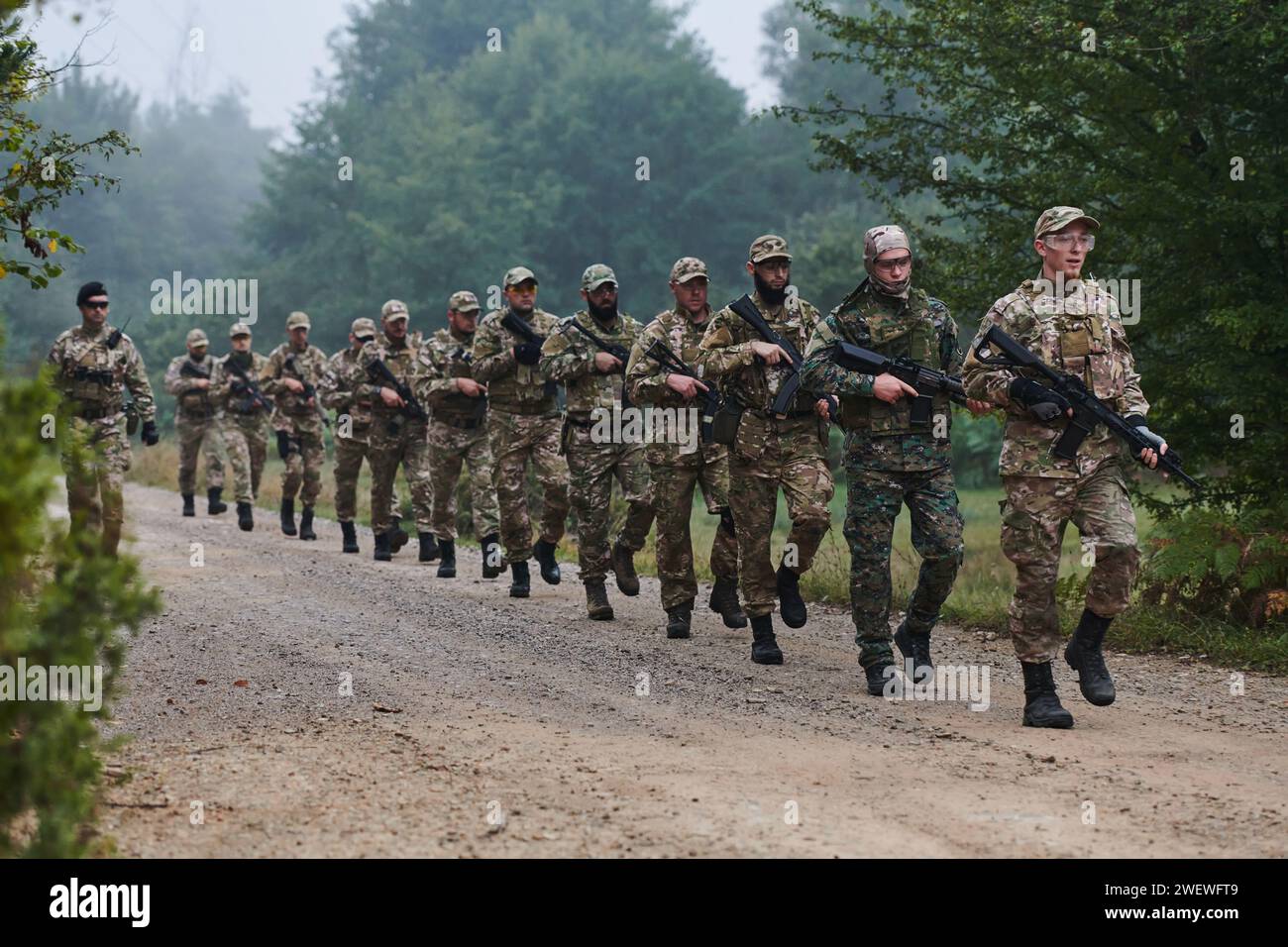 An elite military unit, led by a major, confidently parades through ...