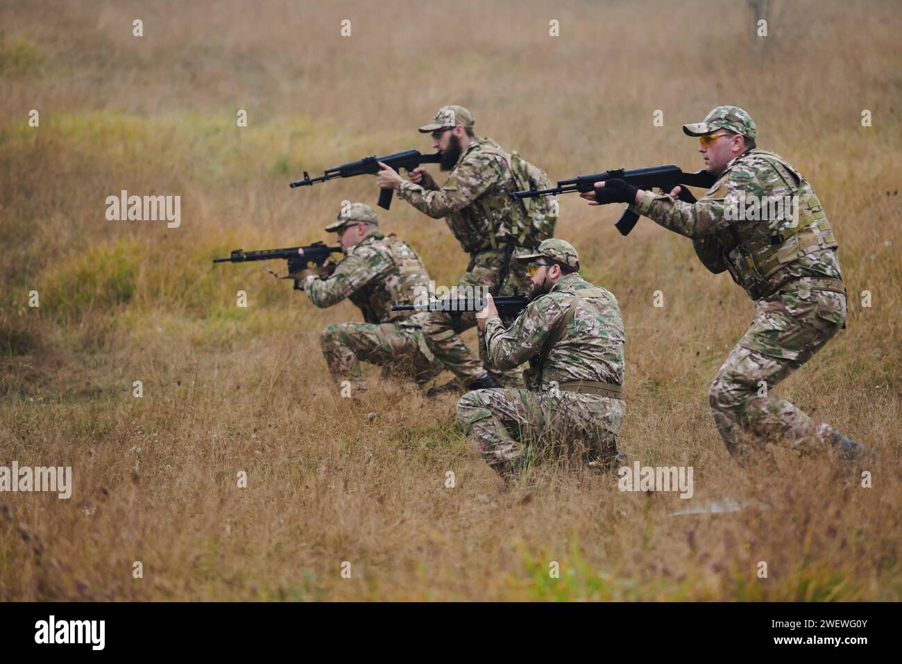 A disciplined and specialized military unit, donned in camouflage ...