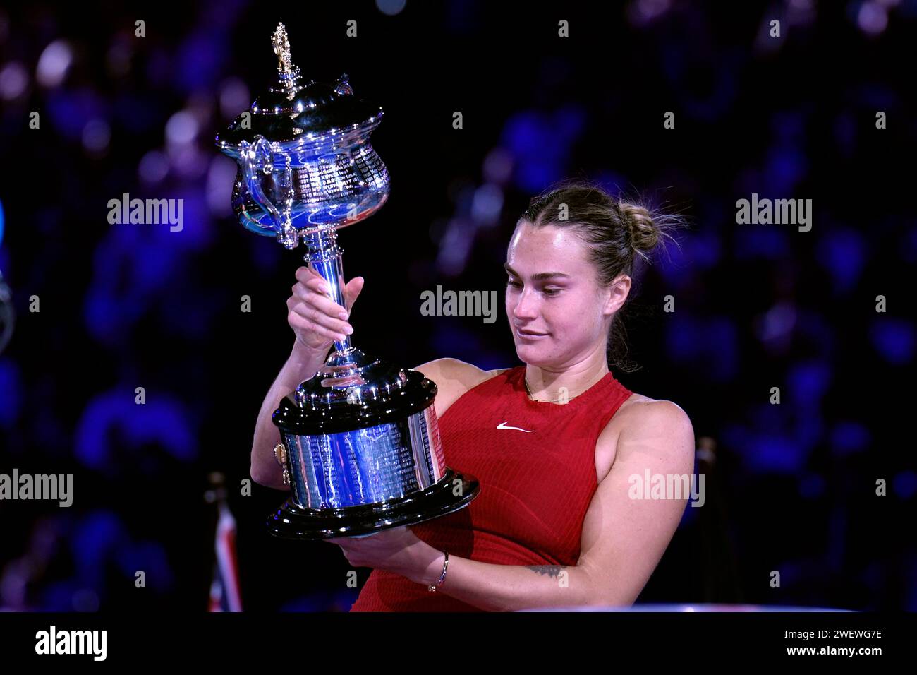 Aryna Sabalenka of Belarus holds the Daphne Akhurst Memorial Cup after defeating Zheng Qinwen of ...