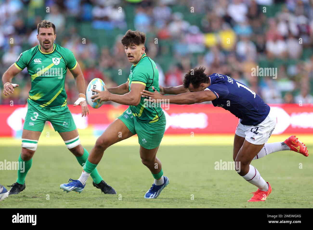 Perth, Australia. 27th Jan, 2024. Chay Mullins of Ireland is tackled by ...