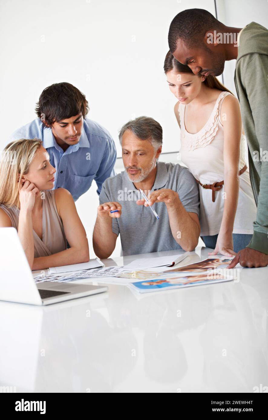 People, teamwork and paperwork or meeting brainstorming at creative agency, collaboration or ...