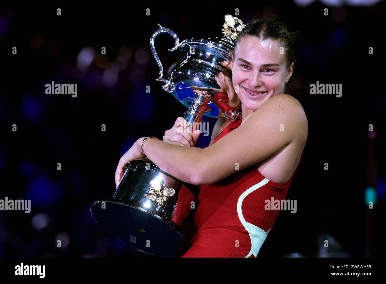 Aryna Sabalenka of Belarus holds the Daphne Akhurst Memorial Cup after defeating Zheng Qinwen of ...