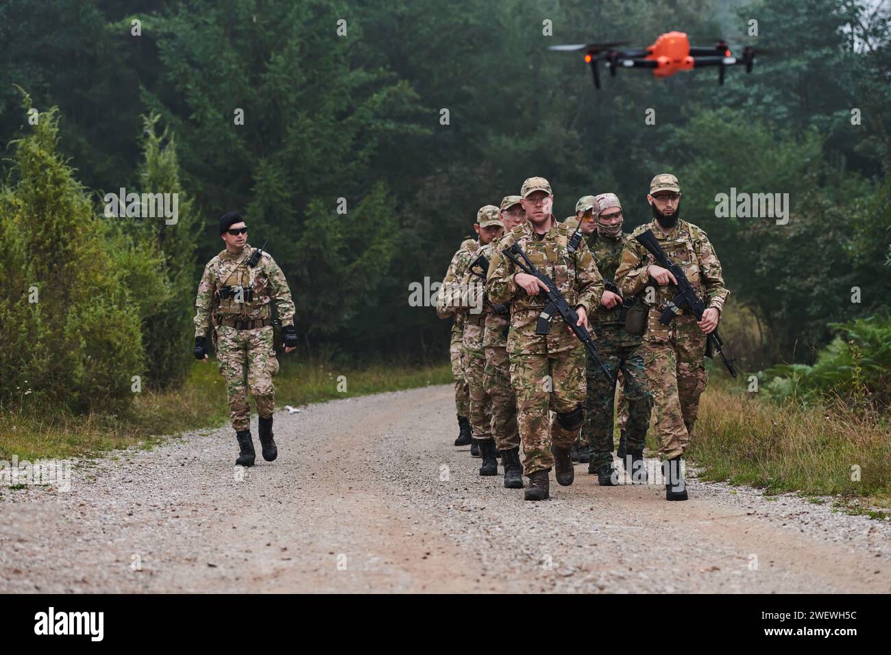 An elite military unit, led by a major, confidently parades through ...