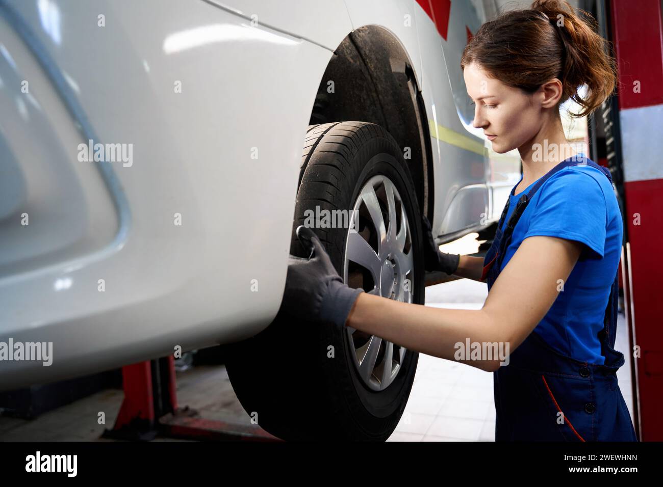 Female auto mechanic inspects hi-res stock photography and images - Alamy