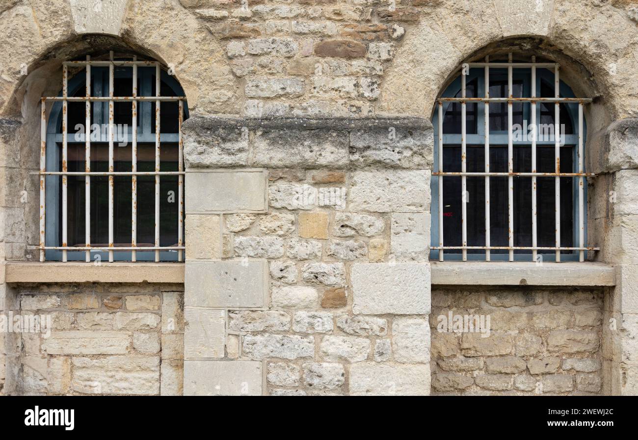Outside of victorian prison with bars at the windows Stock Photo - Alamy