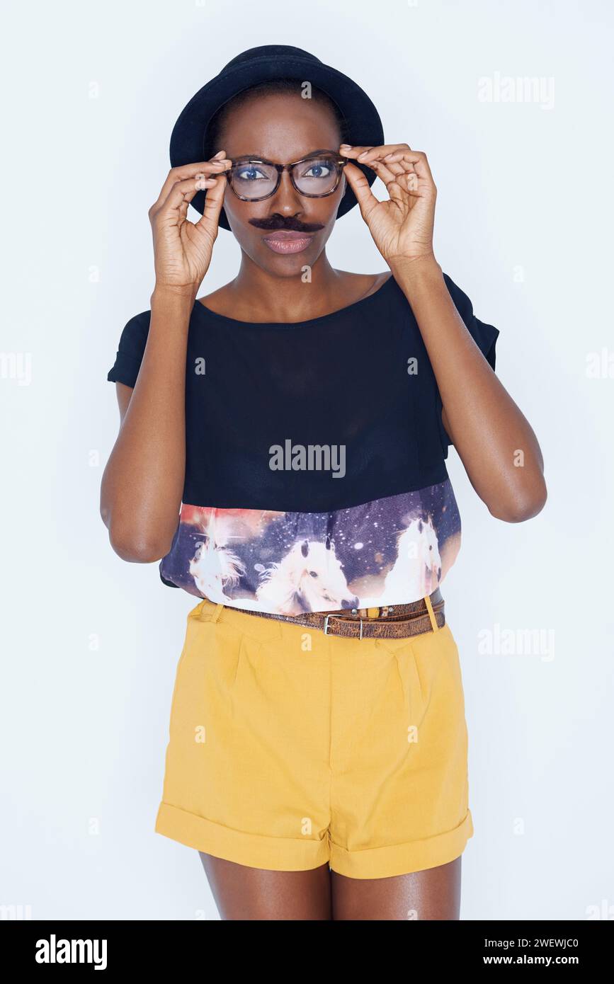 Cool, woman and portrait with mustache in studio with hipster fashion ...