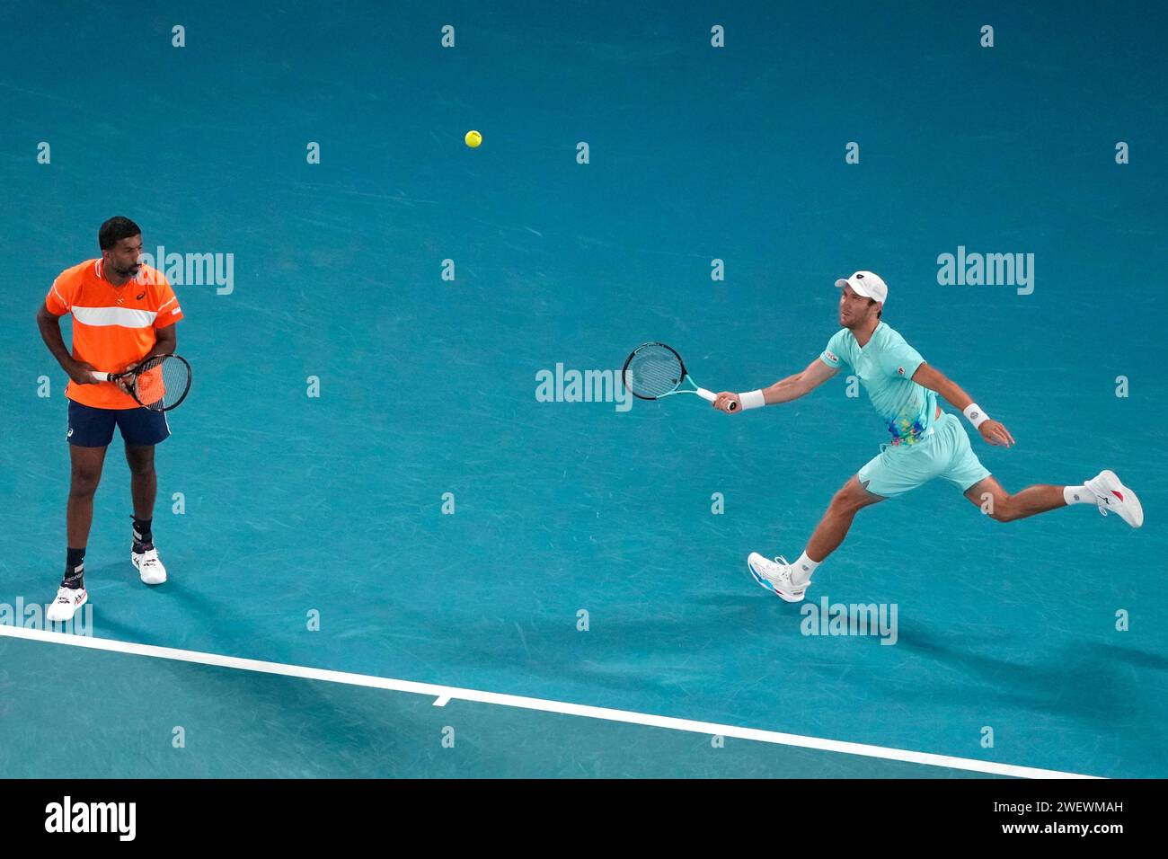 Rohan Bopanna of India and Matthew Ebden, right, of Australia in action against Simone Bolelli ...