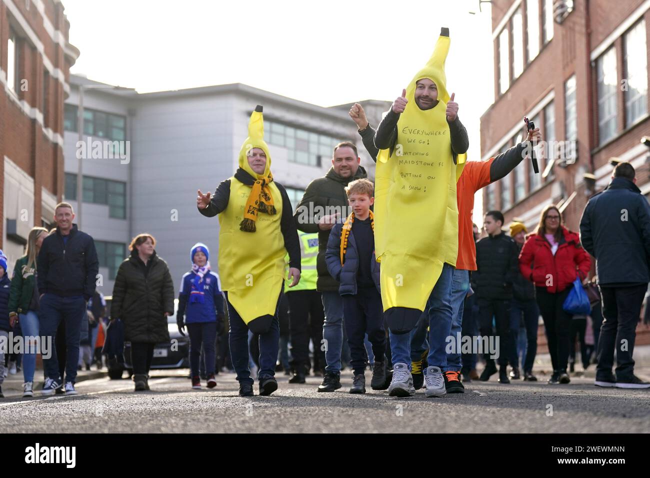 Maidstone United fans dressed as bananas make their way to the stadium ...