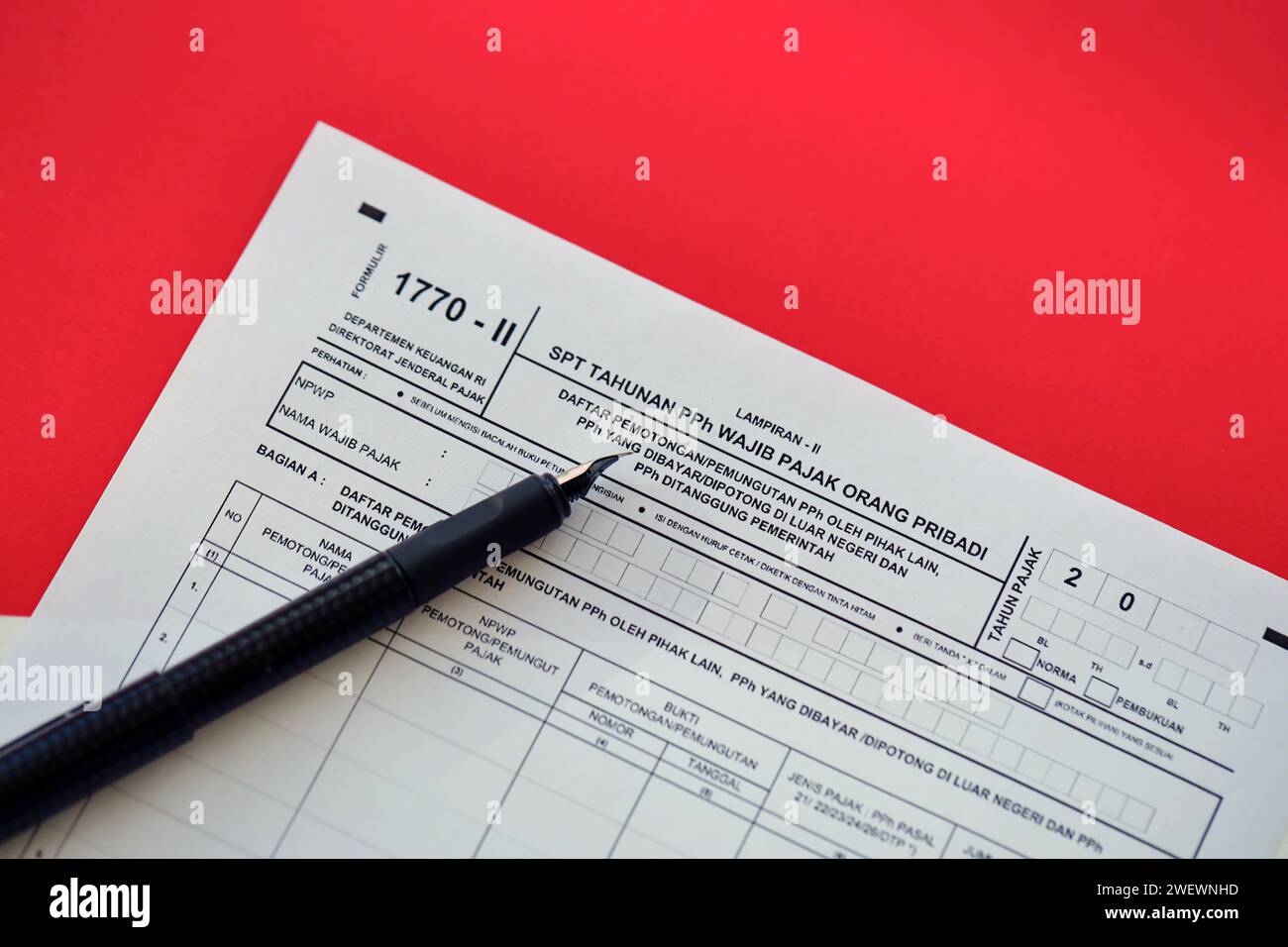 Indonesian tax form 1770-2 Individual Income Tax Return and pen on ...