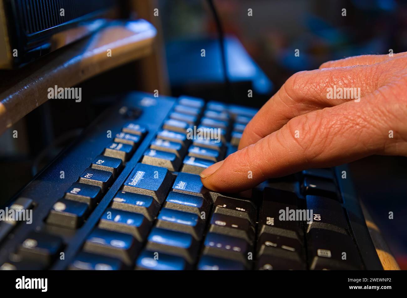 Hand on a button hi-res stock photography and images - Alamy