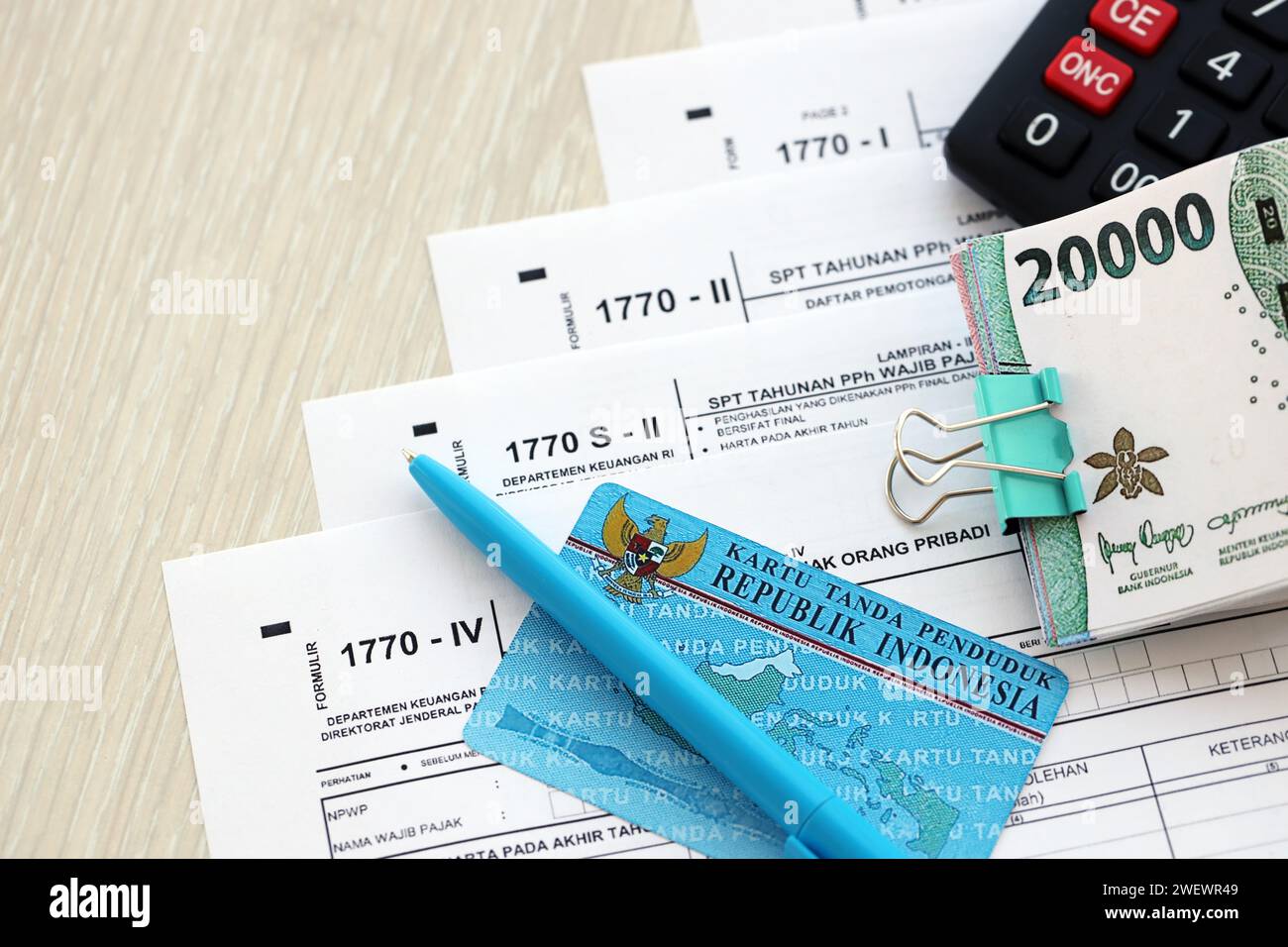 Annual Individual Income Tax Return forms with pen and indonesian ...