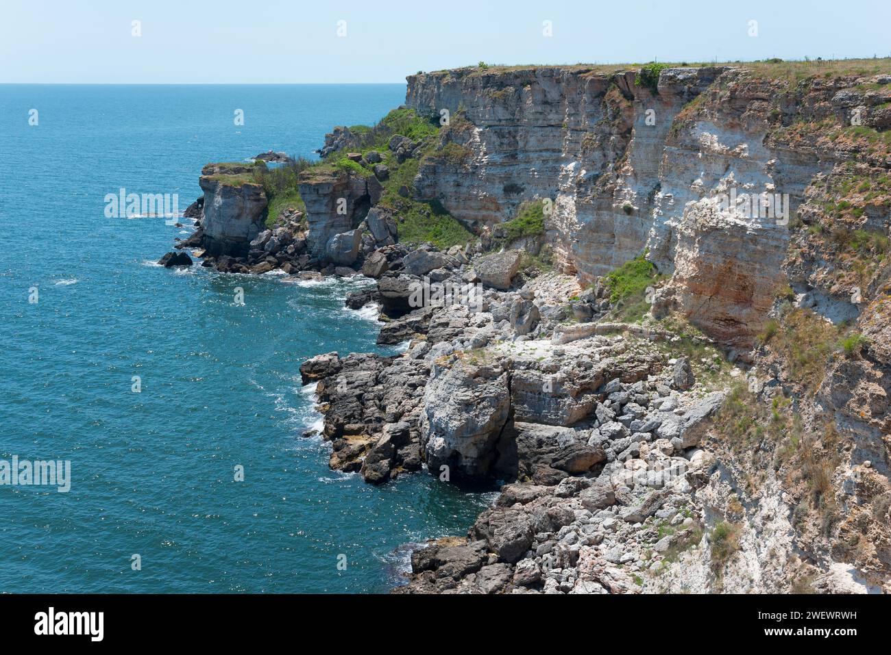 Picturesque cliffs with eroded rock formations on the edge of the ...