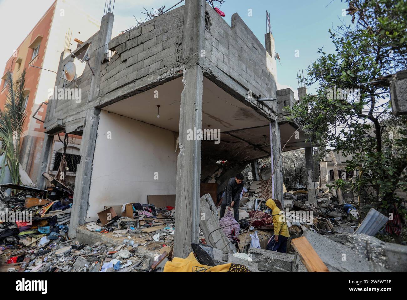 Rafah, Palestinian Territories. 27th Jan, 2024. Palestinians inspect a ...