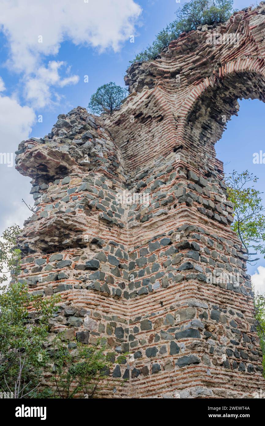 Ancient stone and brick archway into ruins of castle in Istanbul ...