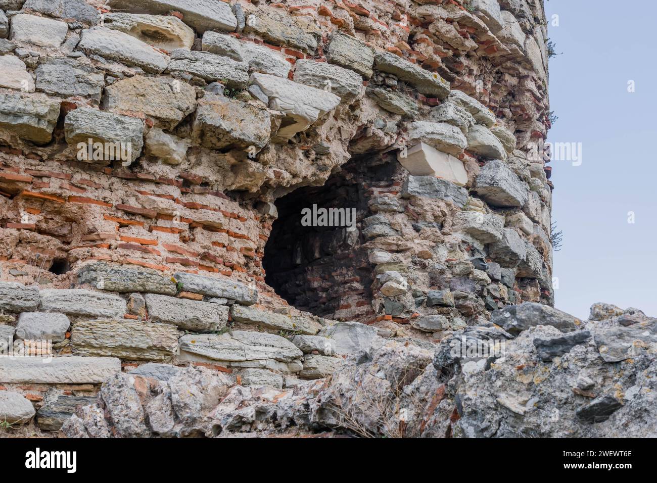 Closeup of hole in side of ancient castle tower ruins in Turkey Stock ...