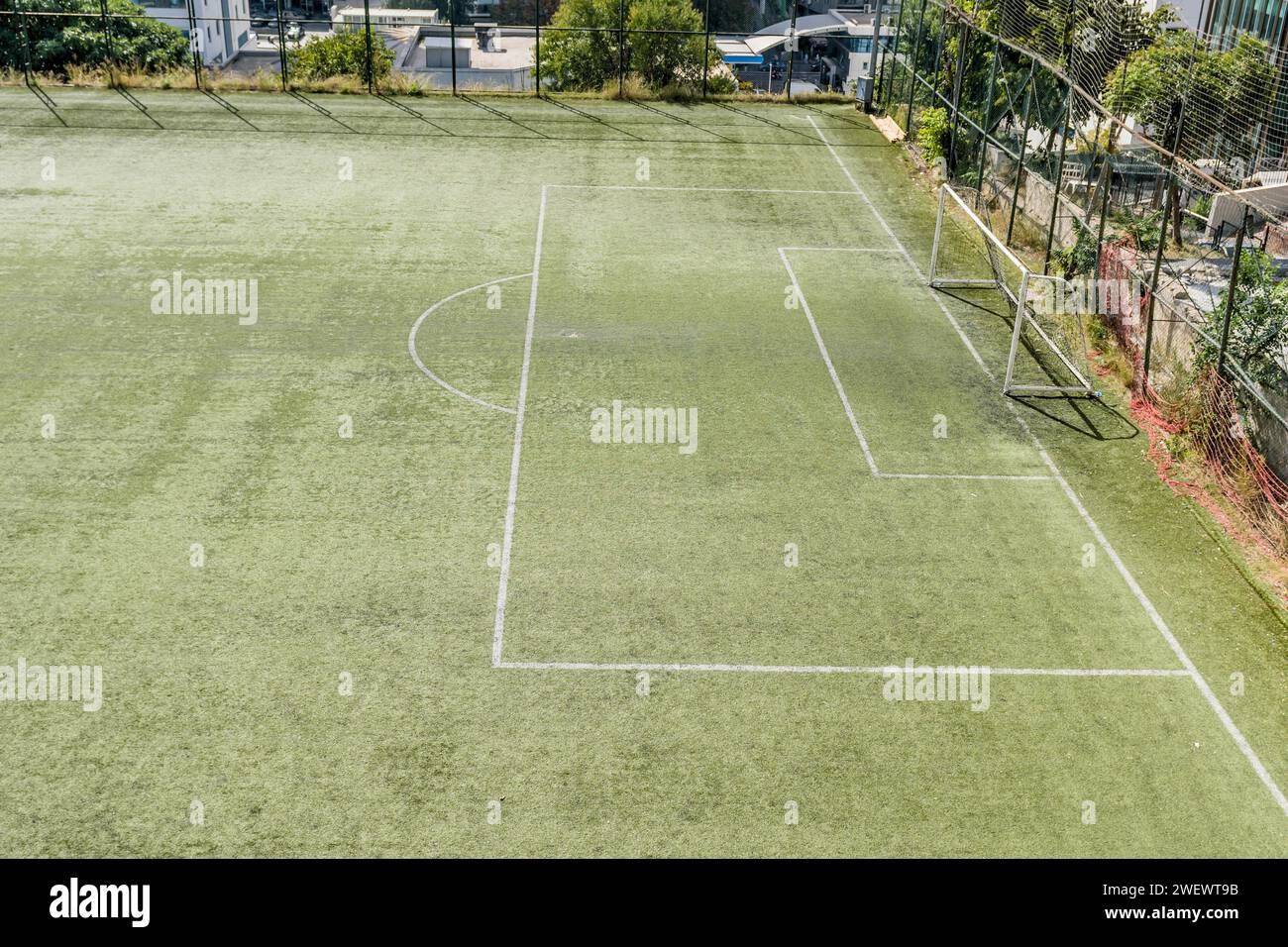 Soccer goal at end of green field in urban park in Istanbul, Tuerkiye ...