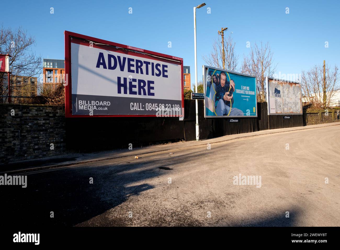 Advertising billboards just off Redstone hill and Redhill railway ...