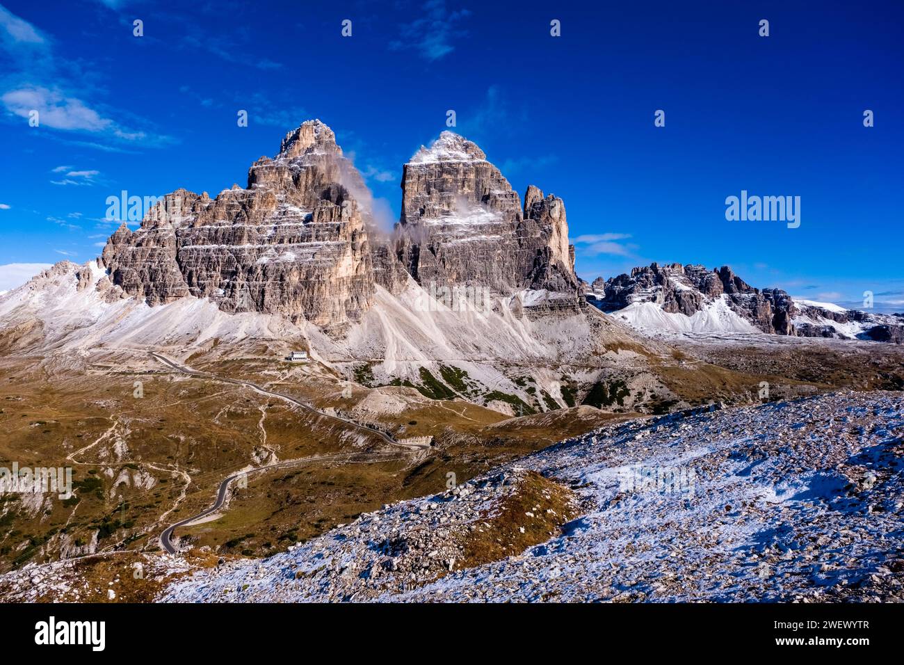 The rocky summits of the rock formation Tre Cime di Lavaredo and the ...