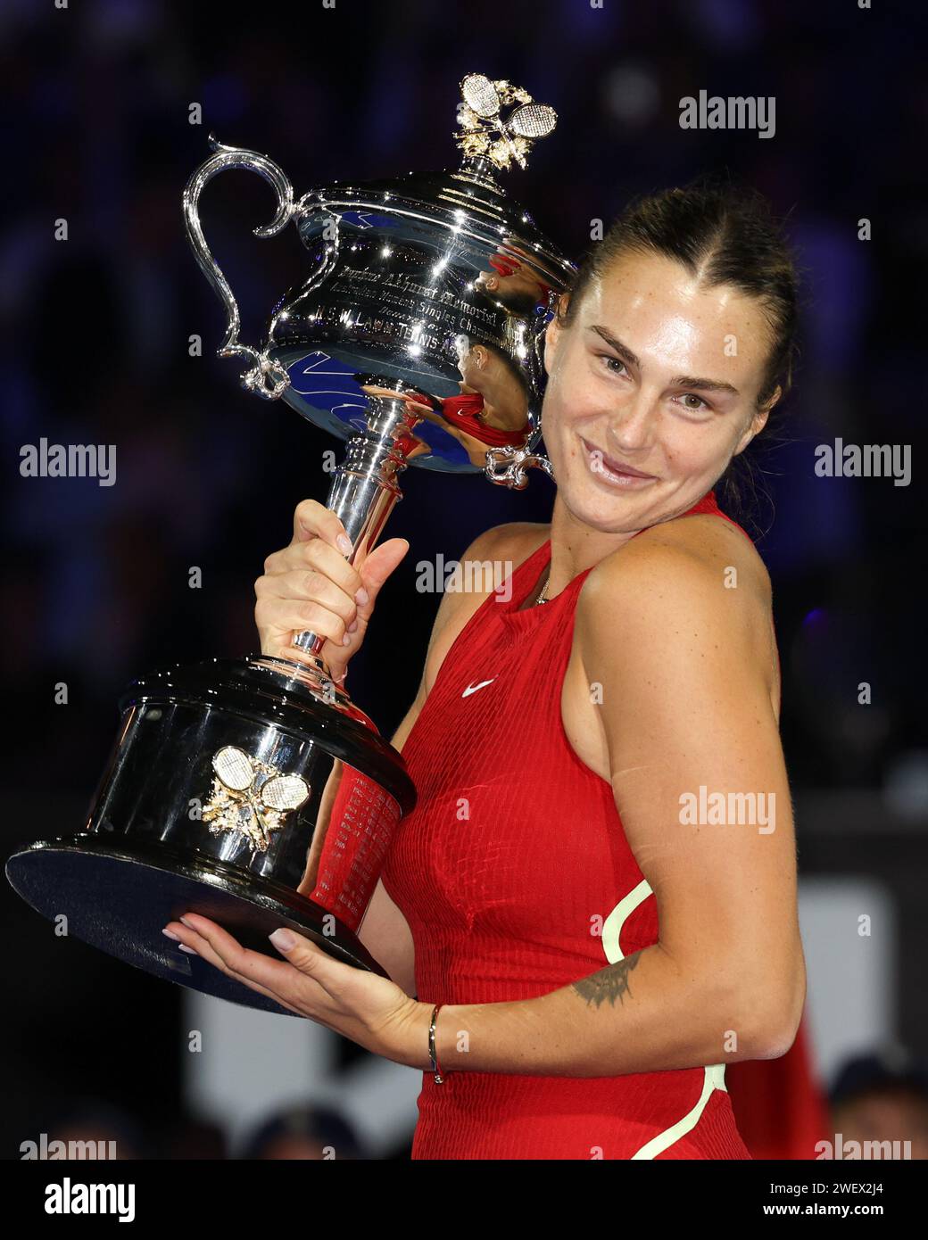 January 27, 2024: 2nd seed ARYNA SABALENKA of Belarus poses with the Daphne Akhurst Memorial Cup ...